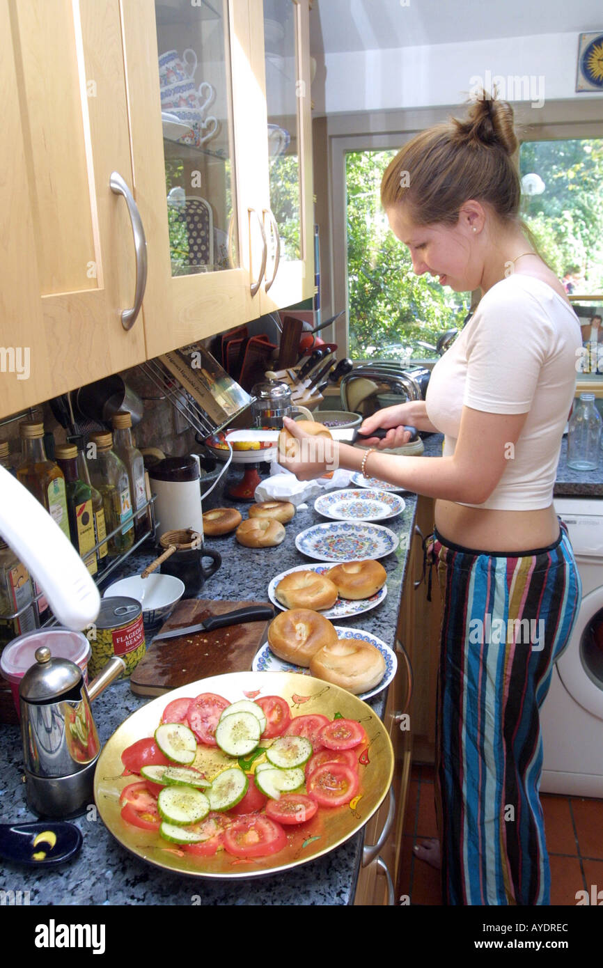 teenage girl preparing a lunch in family kitchen Stock Photo - Alamy