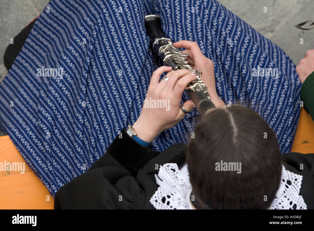 Young woman playing clarinet dressed in Tirolean costume Stock Photo ...