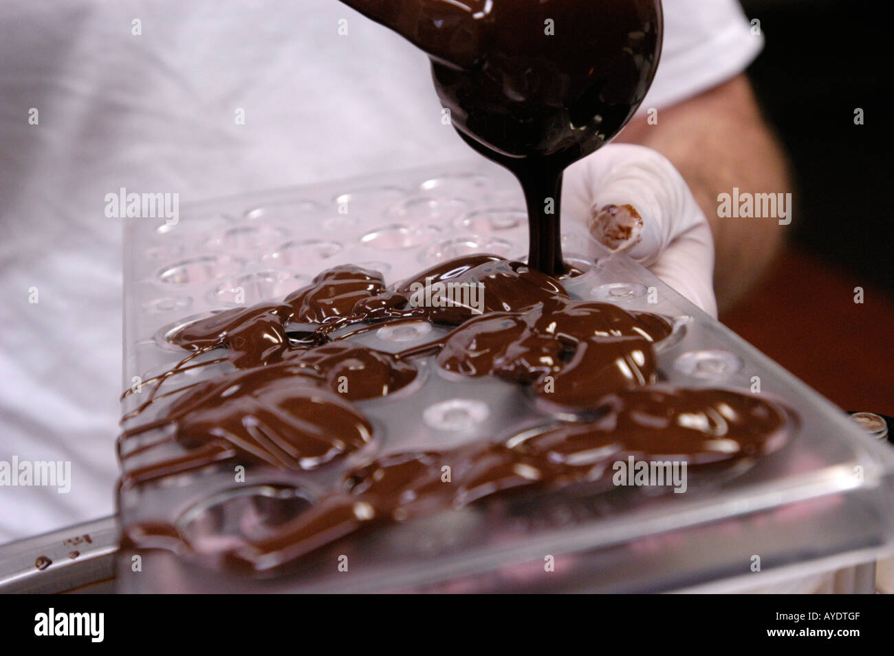 Preparing chocolate candies Gordon M Grant Photo Stock Photo - Alamy