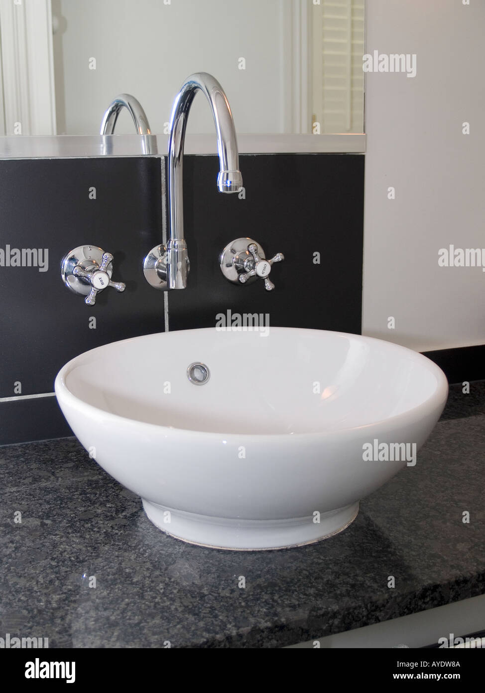 Vanity hand basin in an en suite bathroom Stock Photo - Alamy
