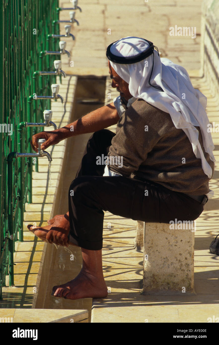 israel Jerusalem old city esplanade of the mosques muslem washing his ...