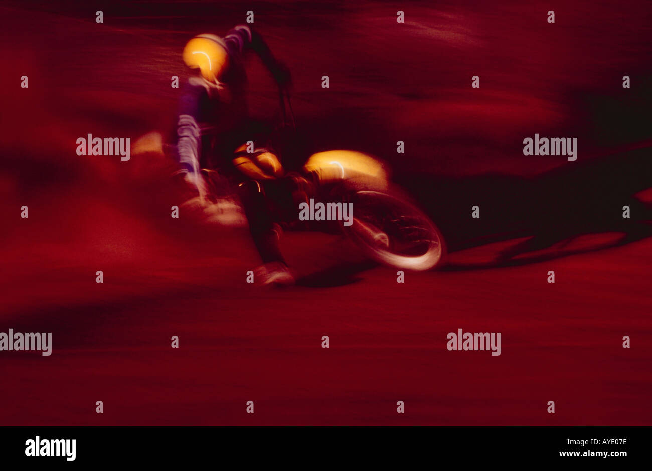 yellow dirt motorcycle with rider blurred action Stock Photo - Alamy