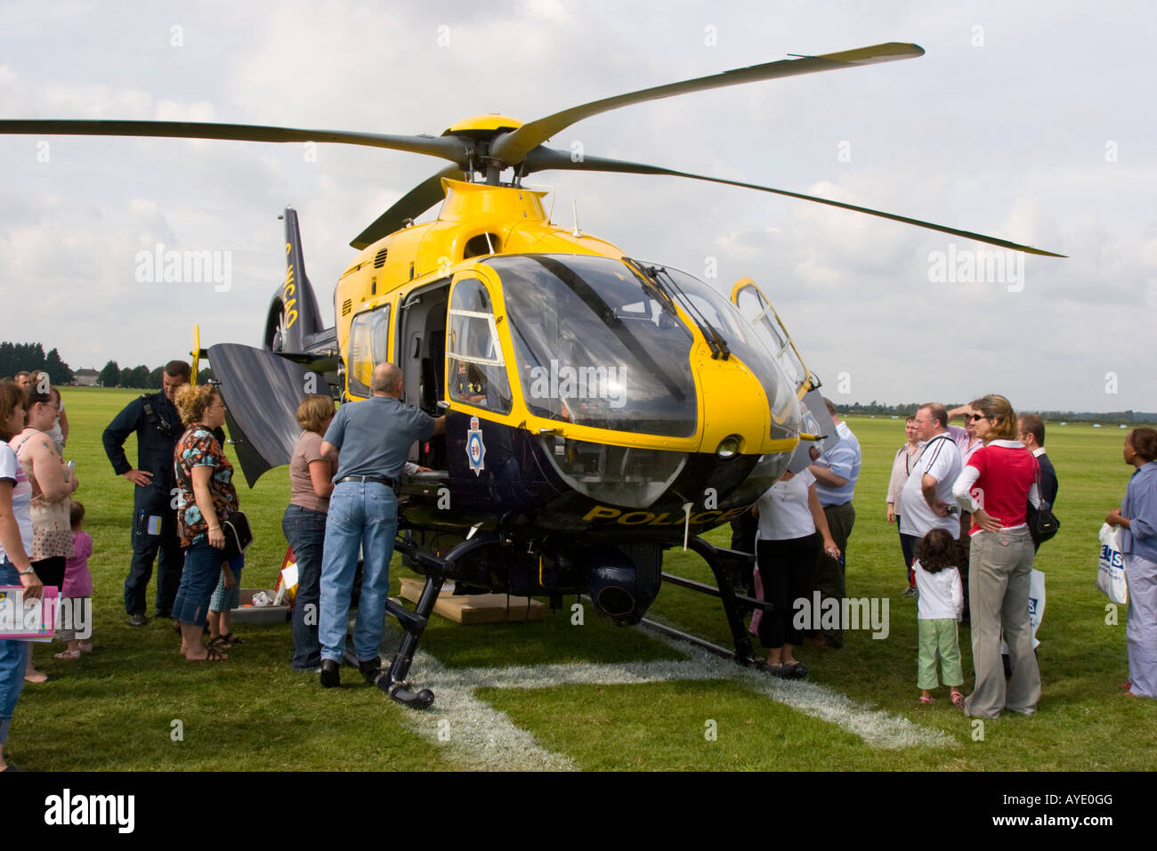 Police helicopter and air ambulance on the ground for public inspection ...