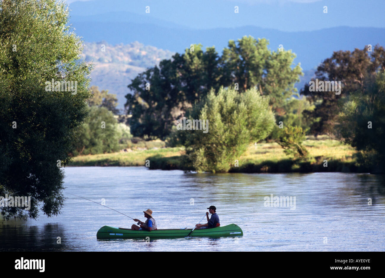Fishermen Upper Murray River near Towong Victoria Australia horizontal ...