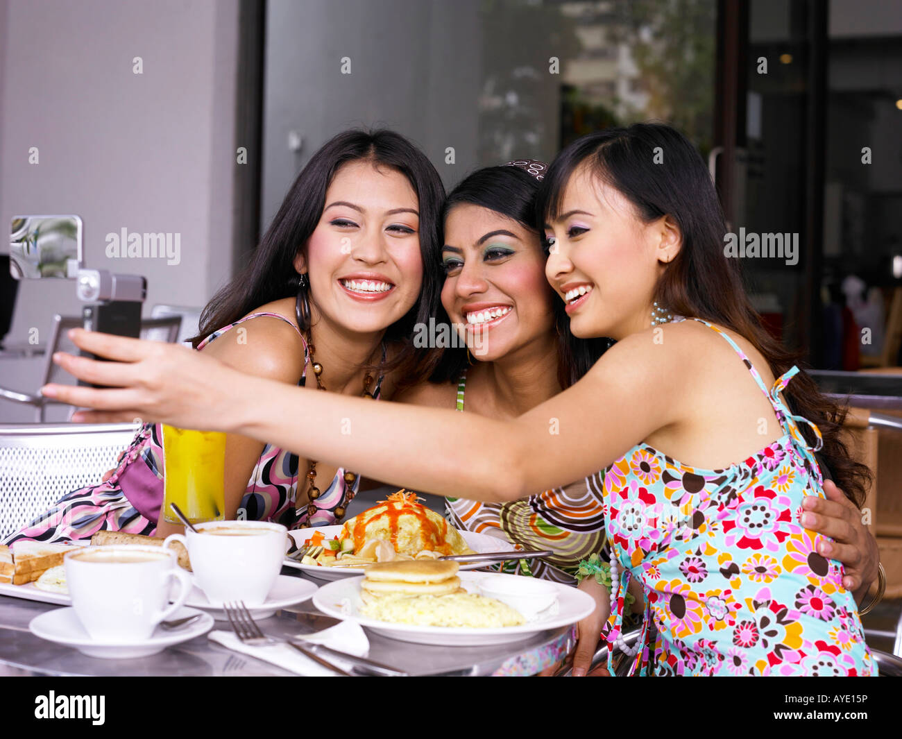 Three women at outdoor garden cafe hi-res stock photography and images ...
