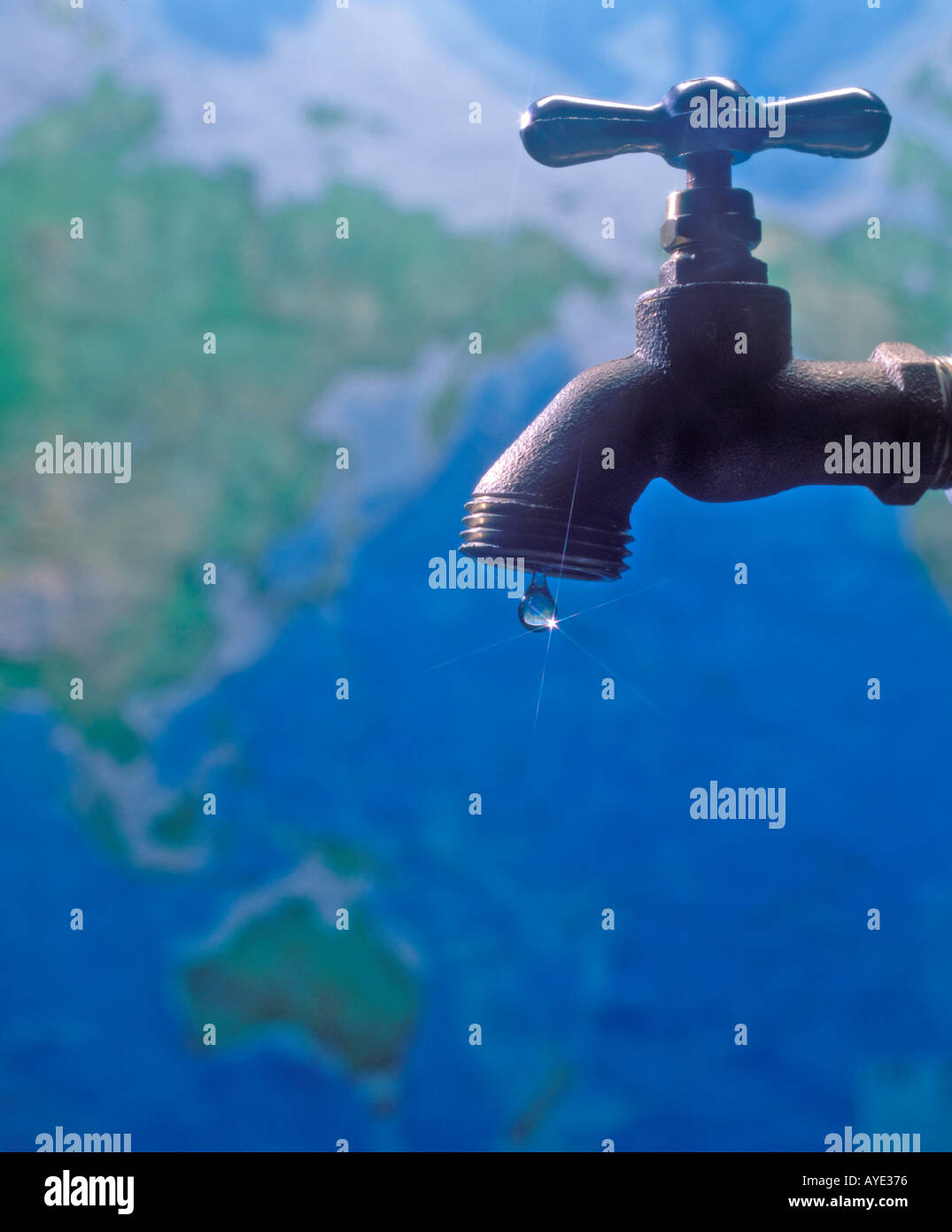 water faucet and world map Stock Photo - Alamy