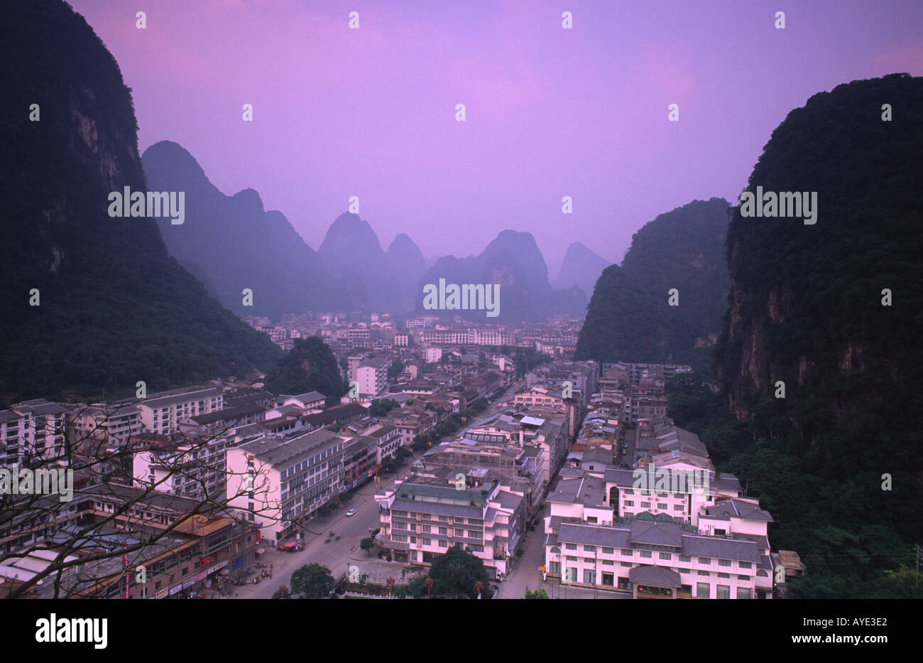 View over the city of Yangshuo China at dawn from the top of Yangshuo ...
