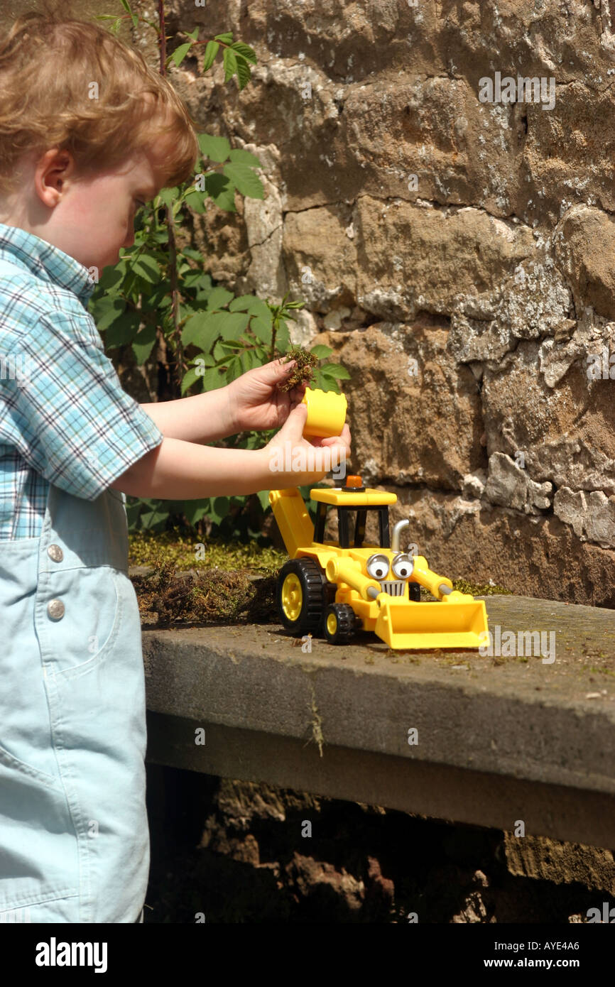 Newstead Abbey Lewis aged two playing with his Scoop model back hoe ...
