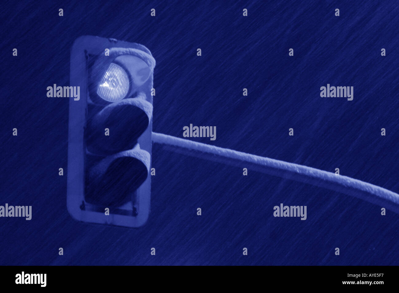 traffic light during winter snow color contrast Stock Photo - Alamy