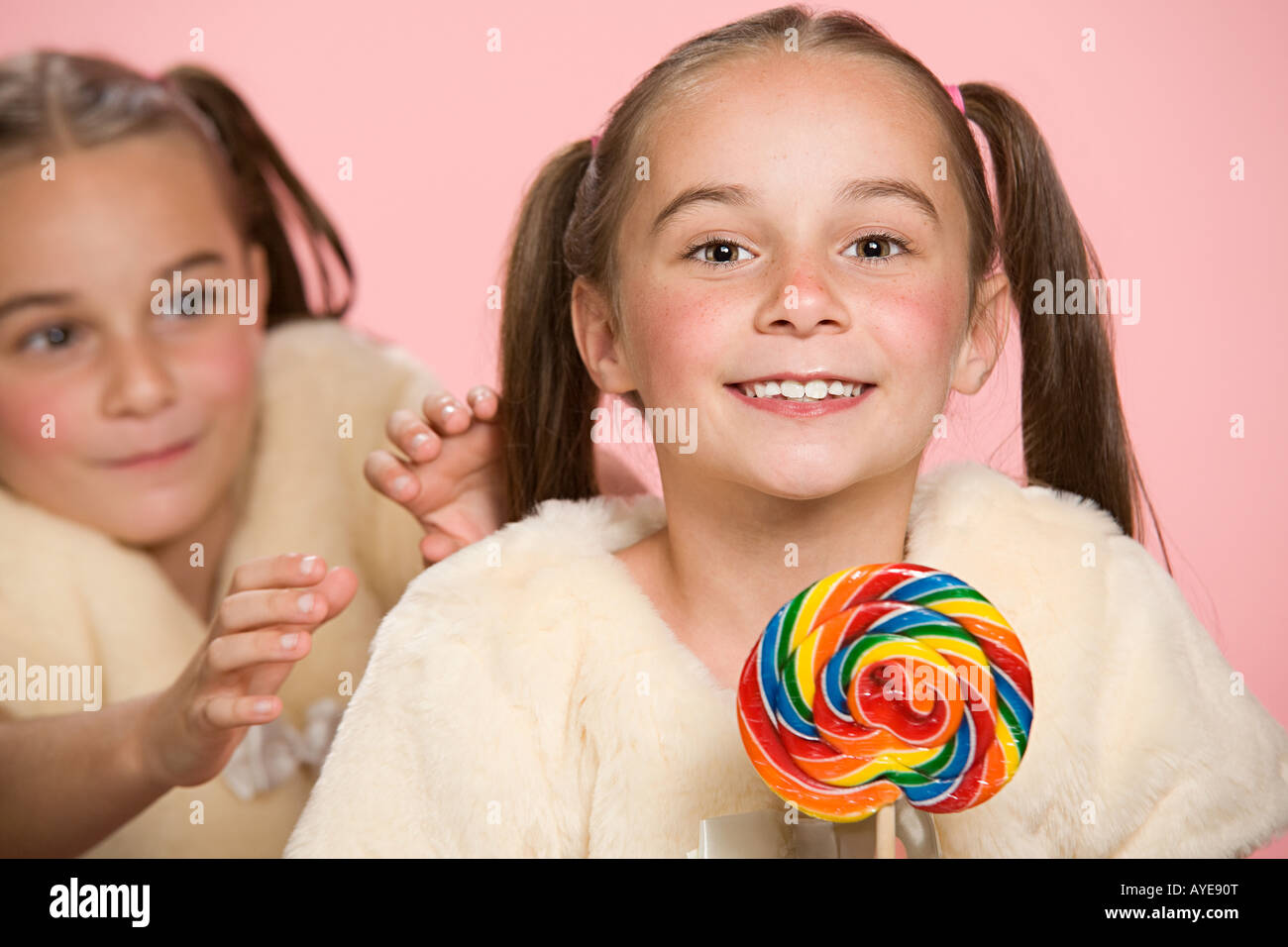 Two girls lolly hi-res stock photography and images - Alamy