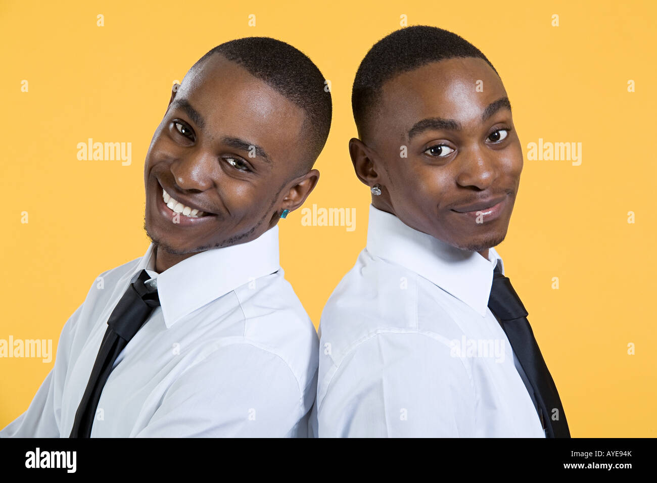 Portrait of twin brothers Stock Photo - Alamy