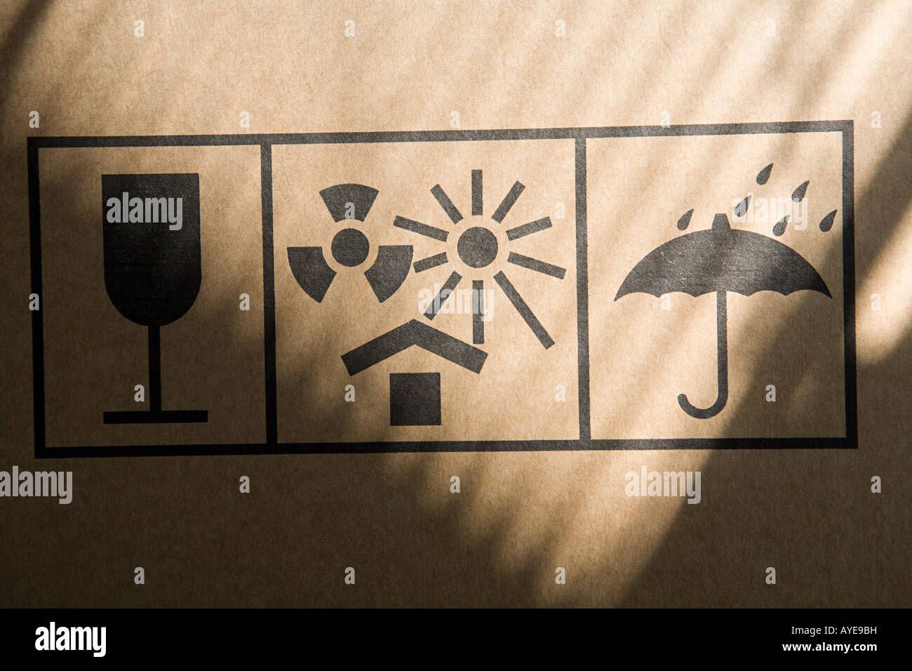 Information sign on a cardboard box Stock Photo - Alamy