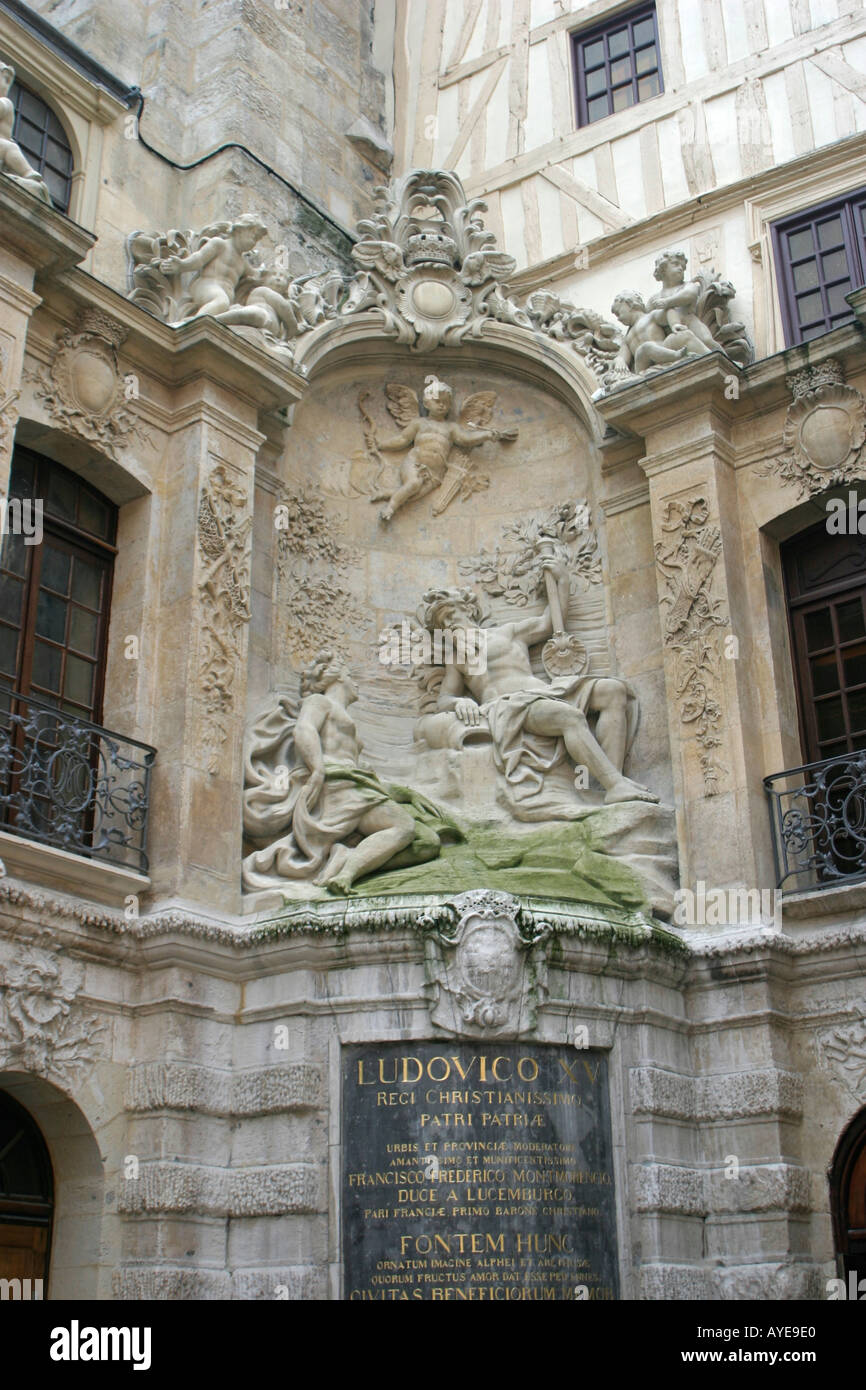 An old fountain at the base of the town belfry, Rouen, Normandy, France ...