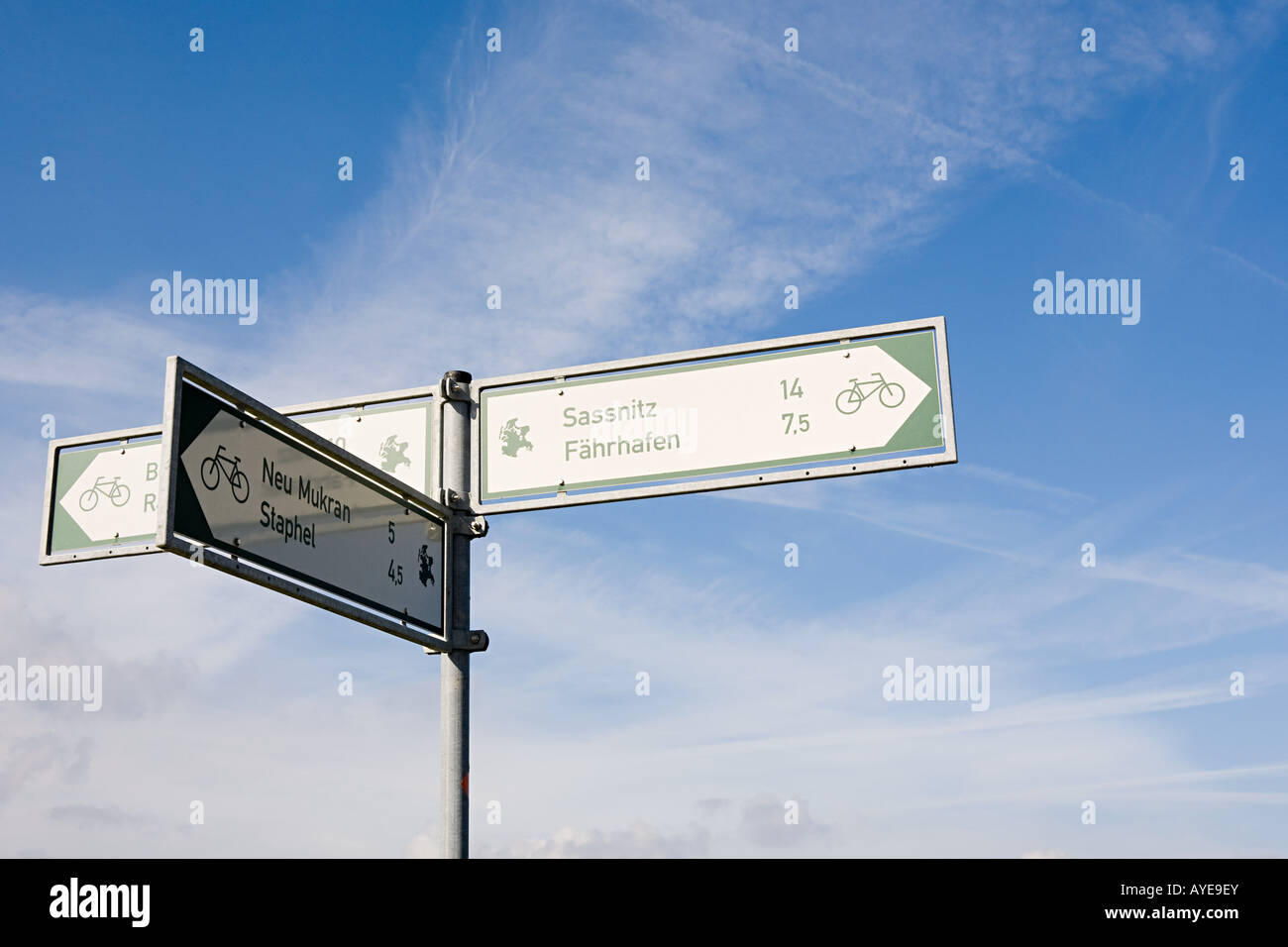 Arrow sign for a cycle path Stock Photo - Alamy