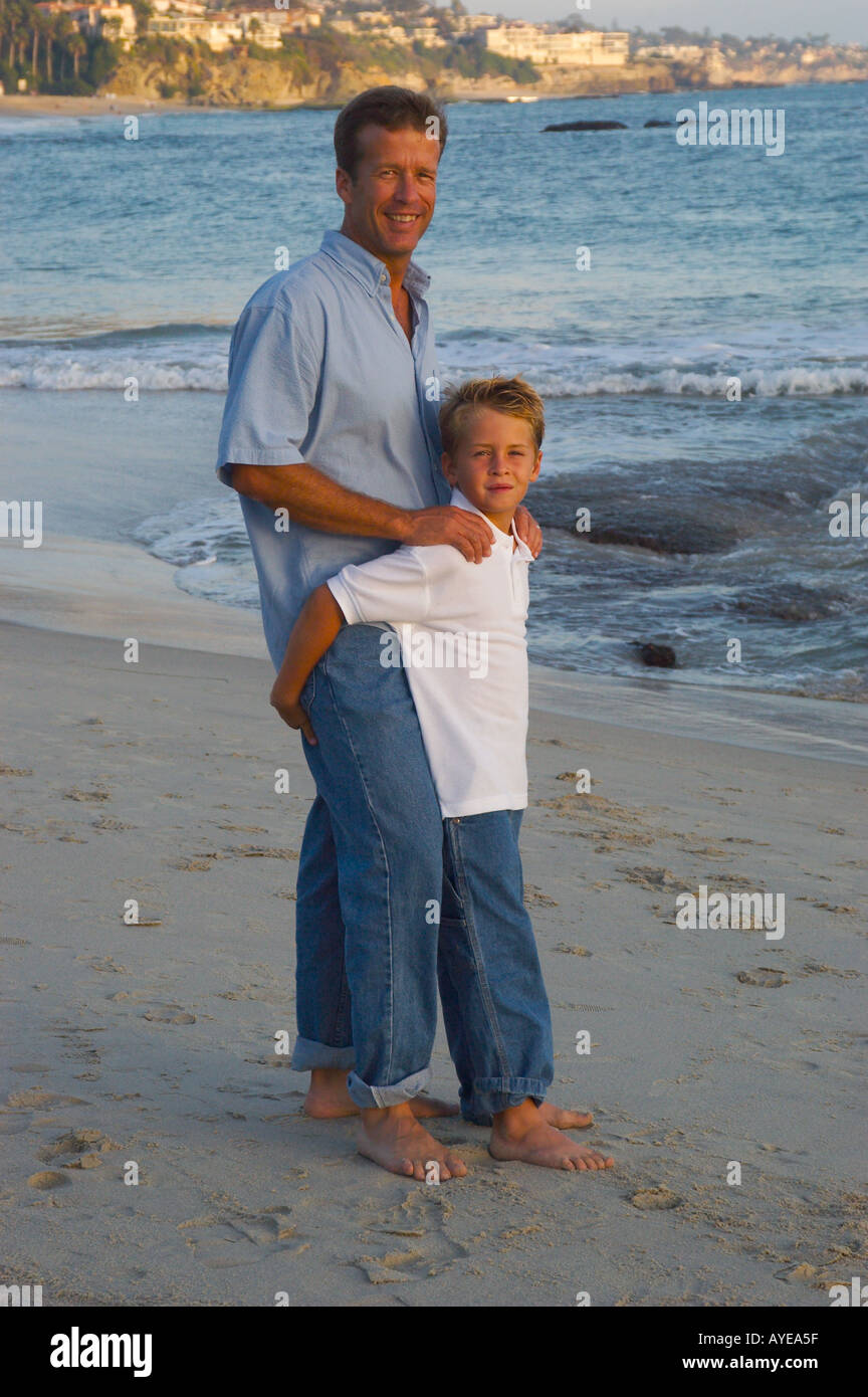 Portrait father two daughters beach hi-res stock photography and images ...