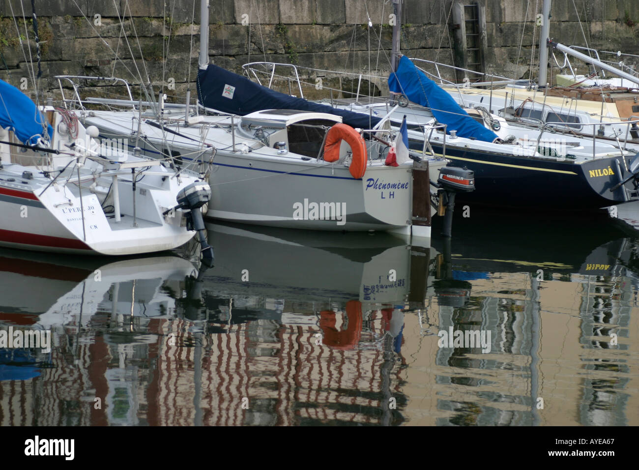 Boats and reflections in the old port at Honfleur Normandy France Stock ...