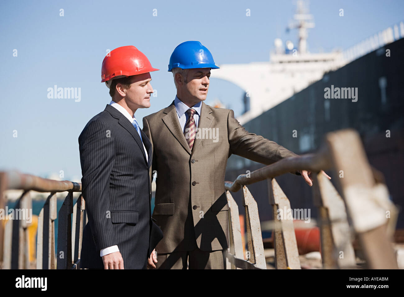 Engineers at harbour Stock Photo - Alamy
