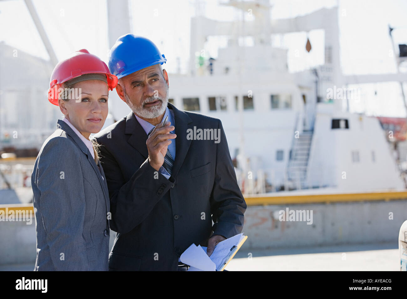 Engineers at harbour Stock Photo - Alamy