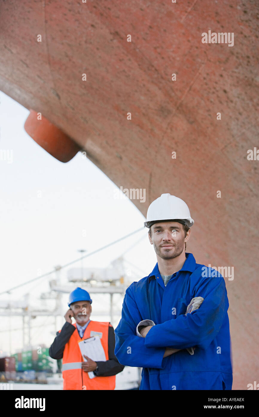 Workers by ship Stock Photo - Alamy