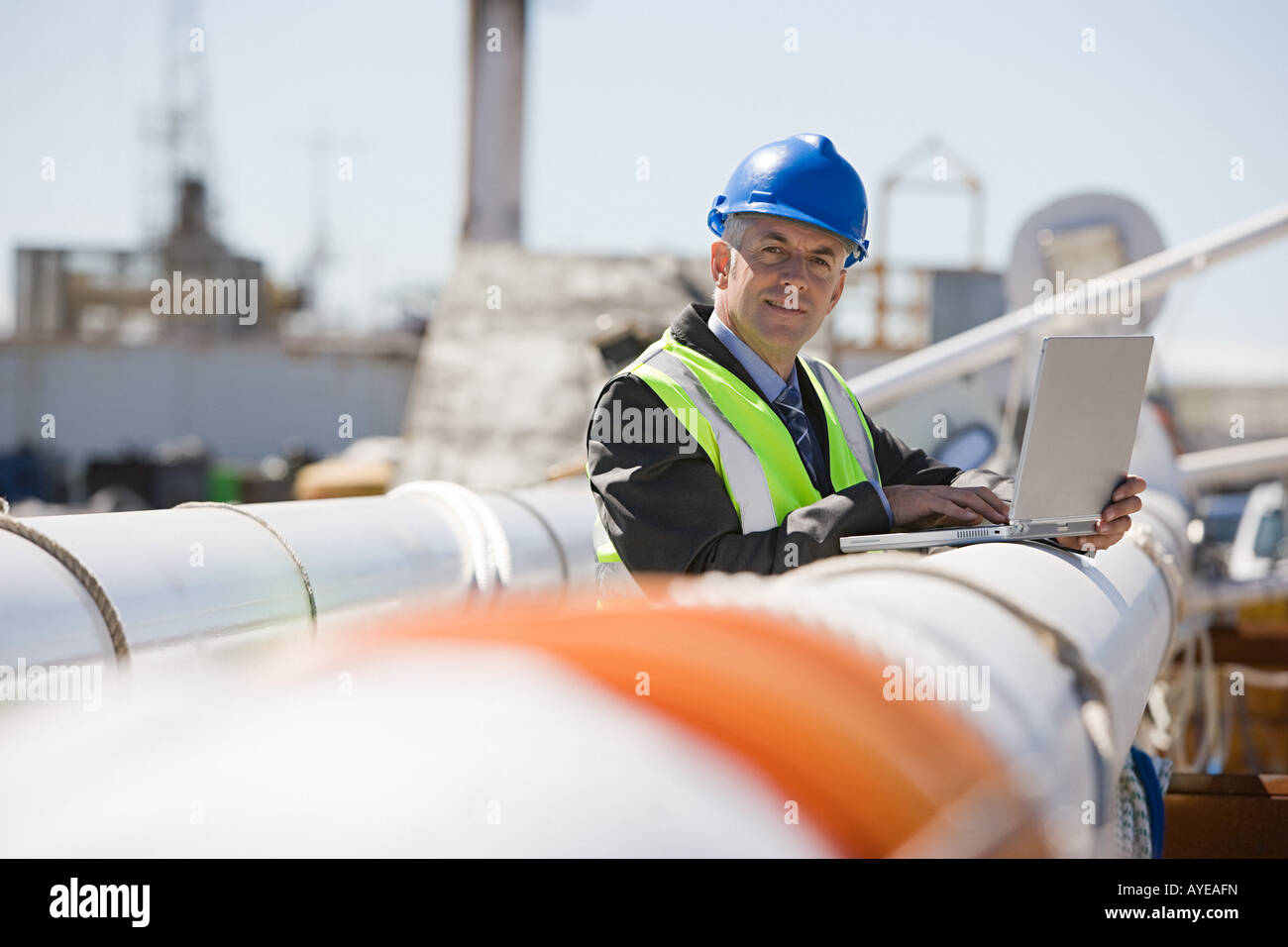 Engineer with laptop Stock Photo - Alamy