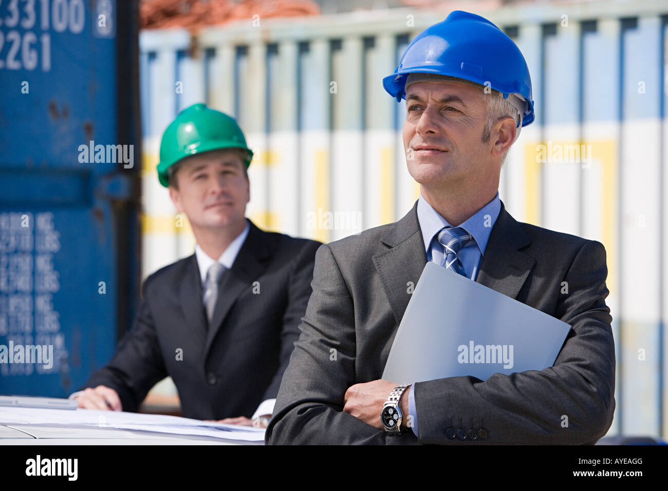 Engineers at container terminal Stock Photo - Alamy