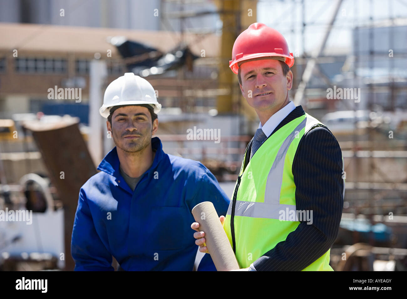 Workers at harbour Stock Photo - Alamy