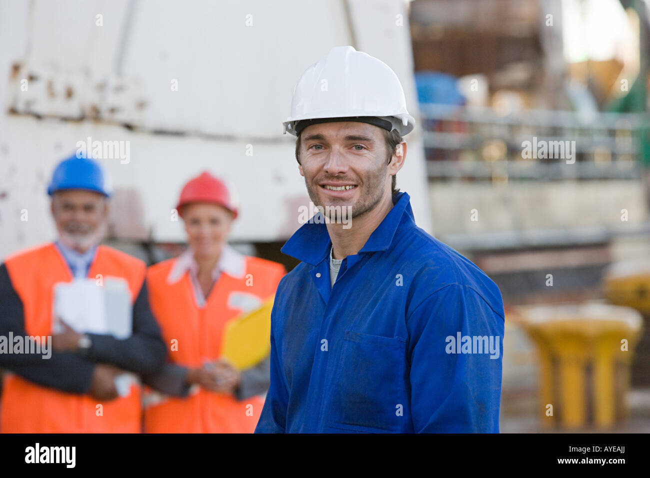 Workers at harbour Stock Photo - Alamy