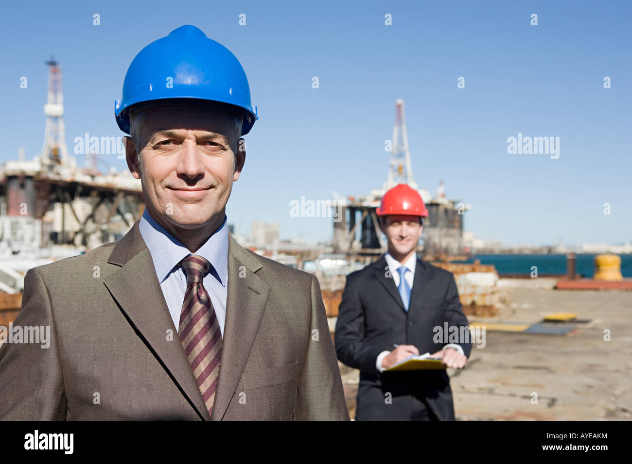 Engineers at harbour Stock Photo - Alamy