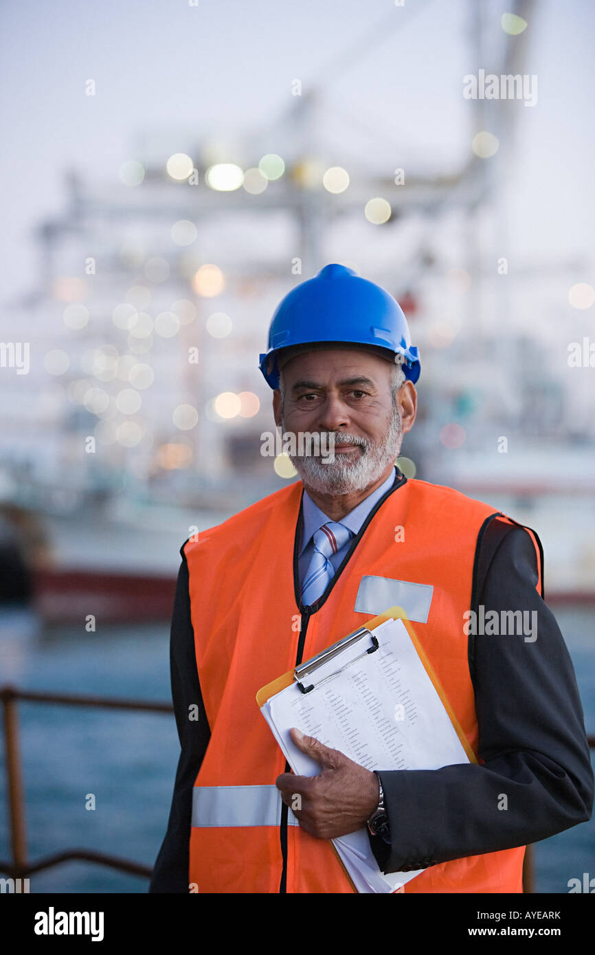 Engineer at harbour Stock Photo - Alamy