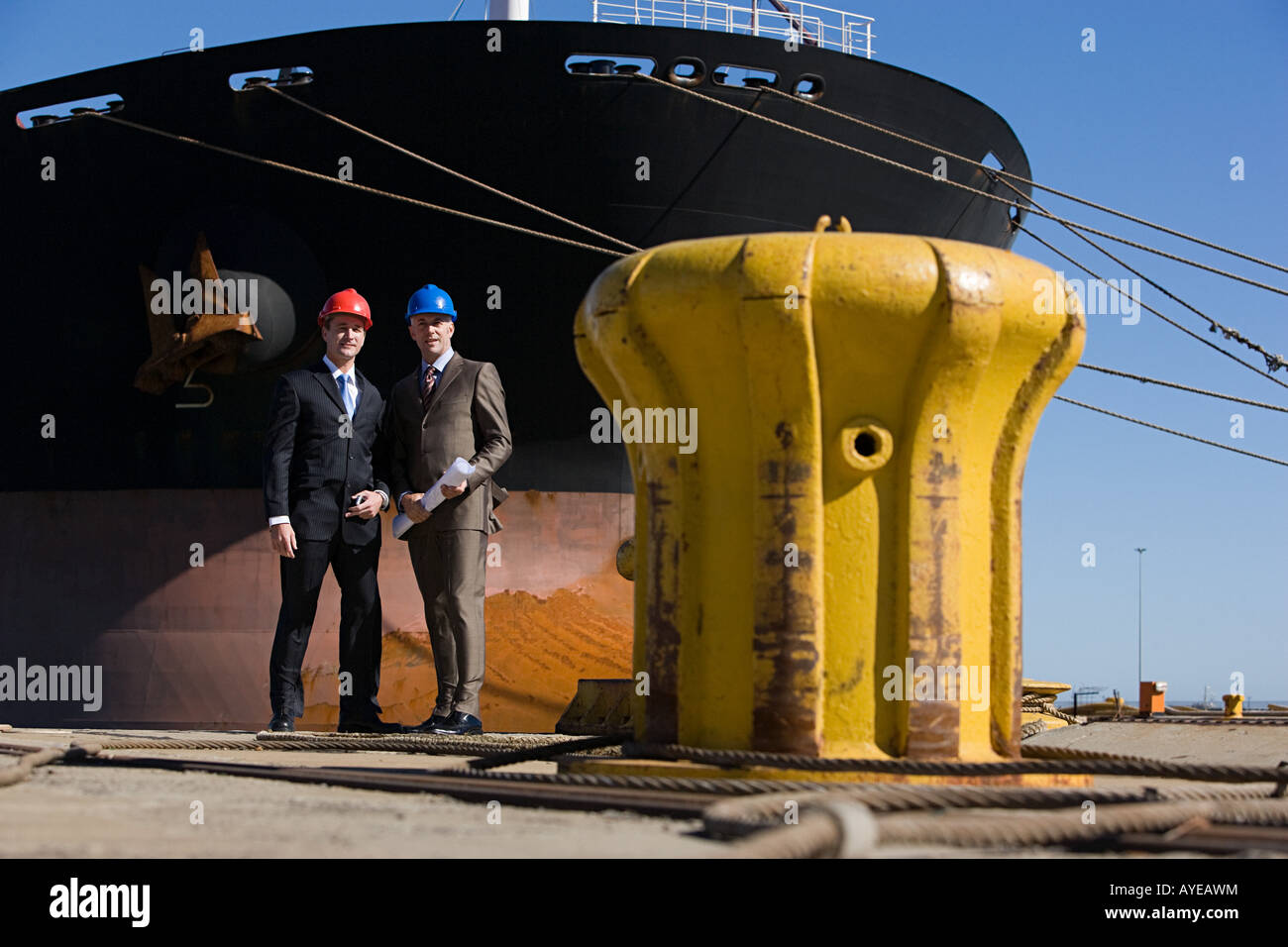 Engineers by ship Stock Photo - Alamy
