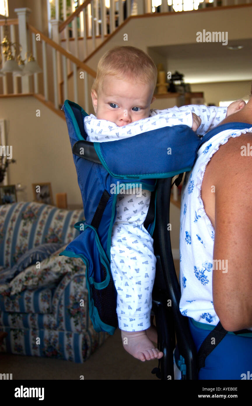 baby in carry pack Stock Photo - Alamy