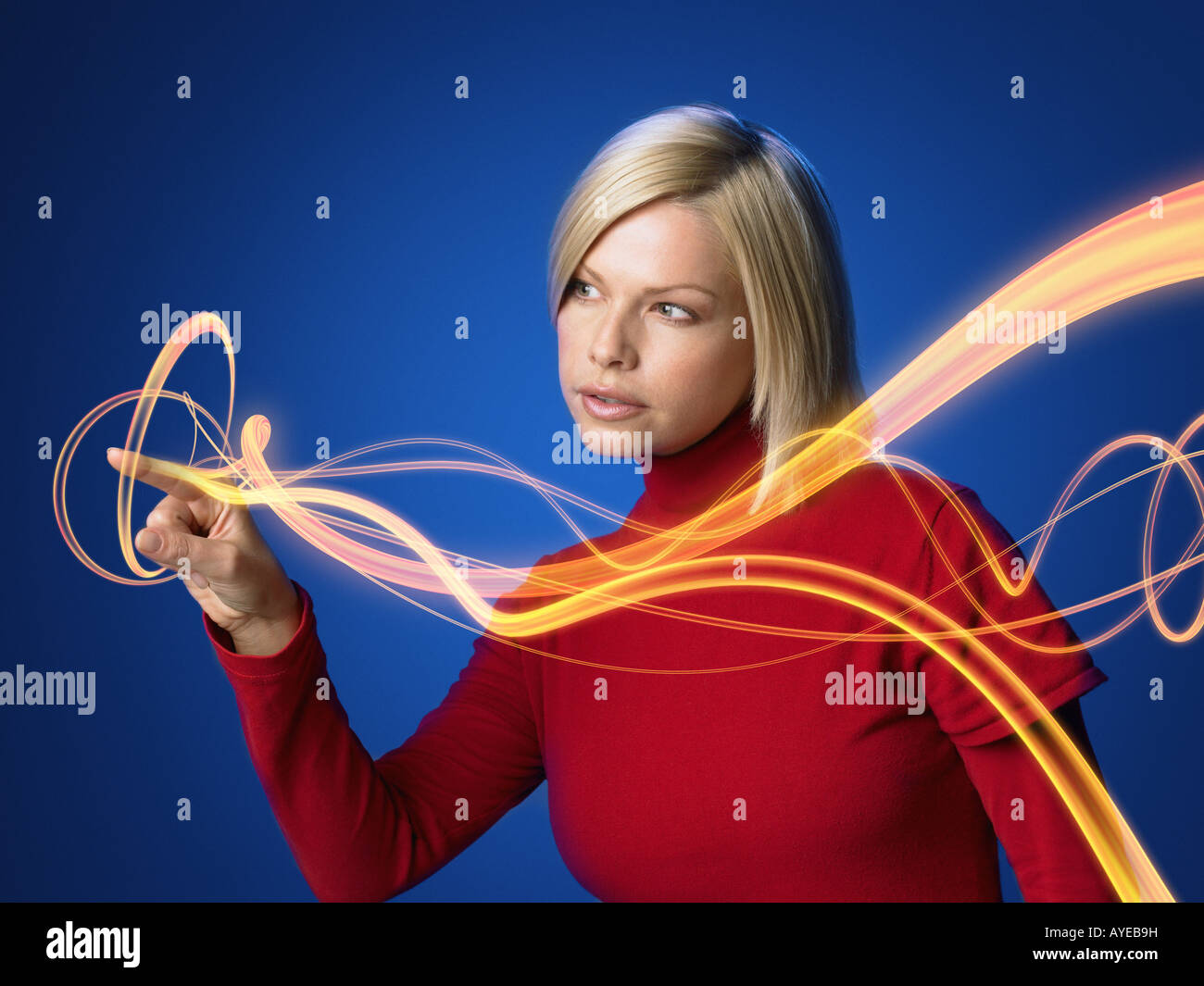 Woman touching light Stock Photo - Alamy