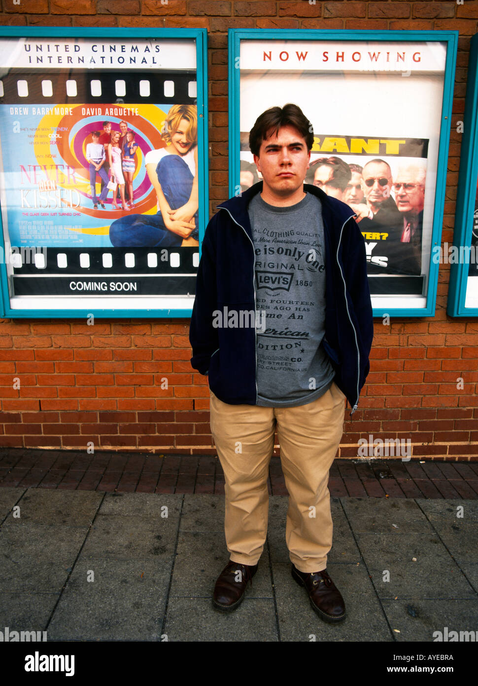 Man Standing Outside Cinema Waiting Stock Photo - Alamy