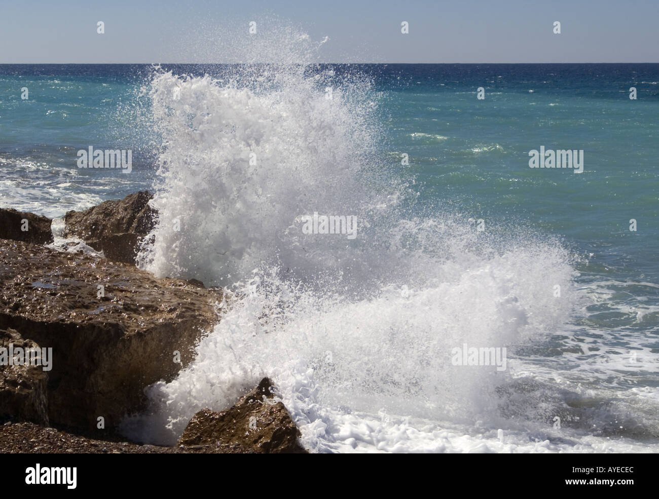 waves breaking on rocks Stock Photo - Alamy