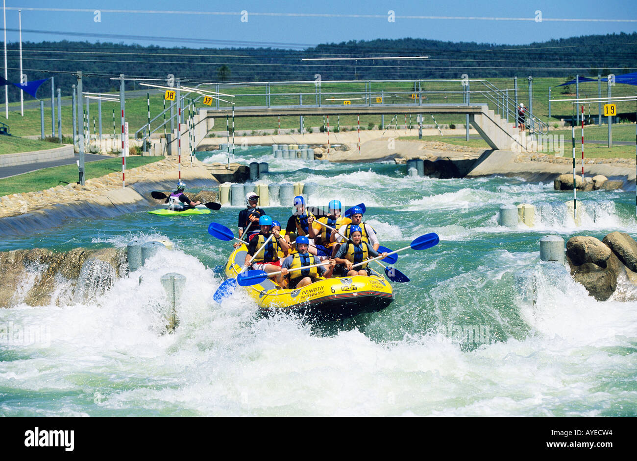 People in a yellow raft white water rafting at Penrith White Water ...