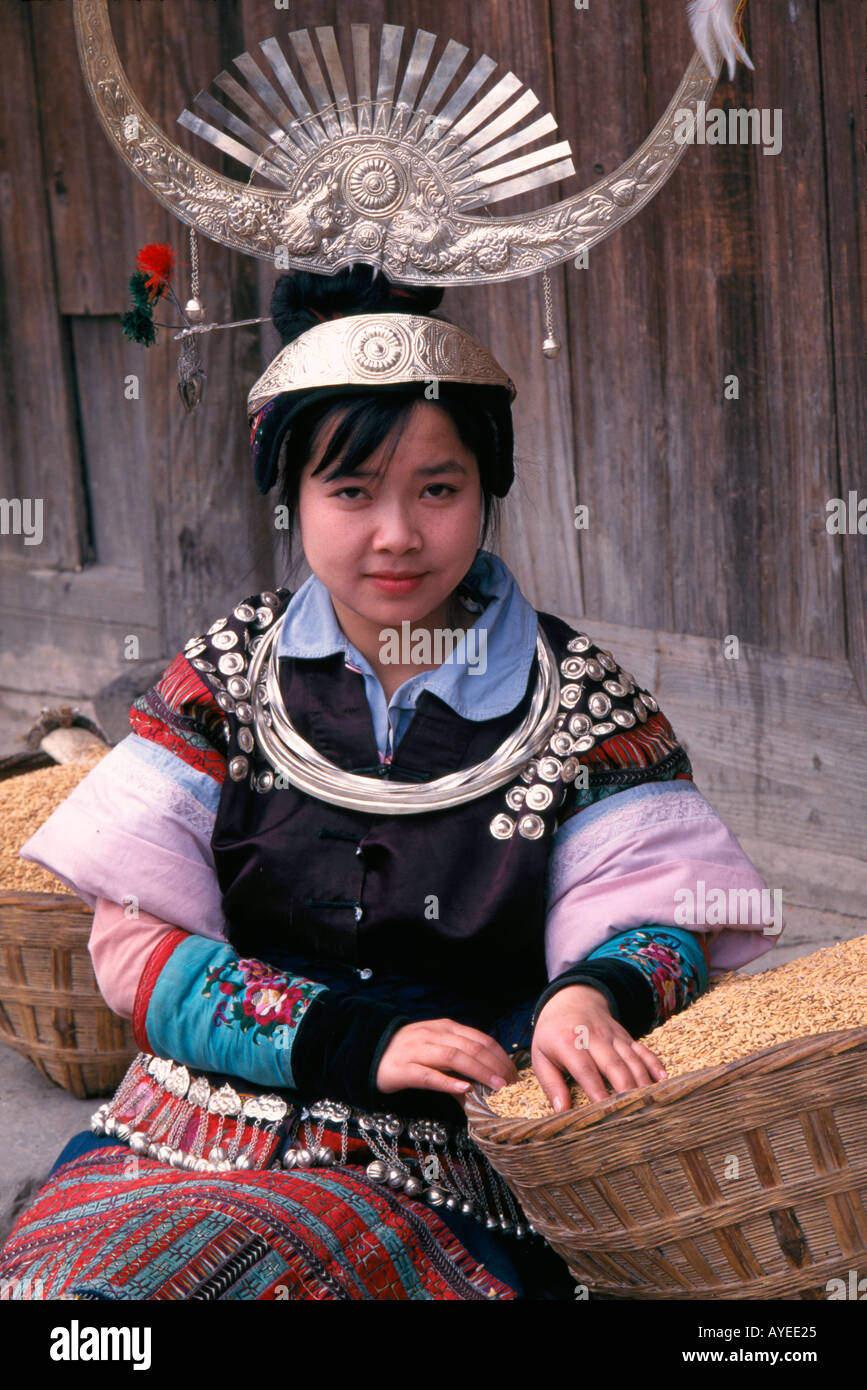 Wengxiang Miao girl in traditional costume with basket Kaili Guizhou ...