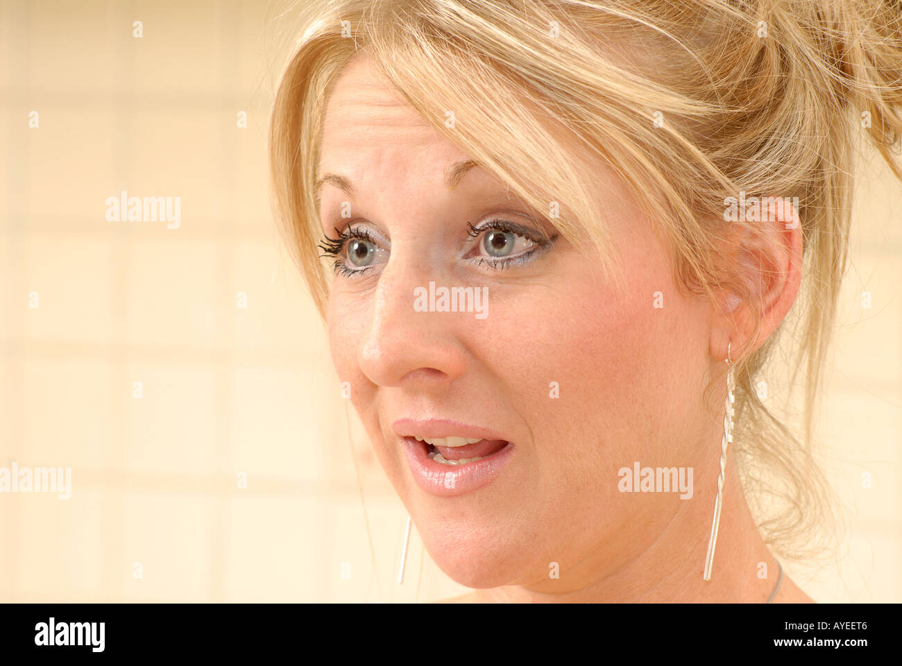 Surprised young woman smiling hi-res stock photography and images - Alamy