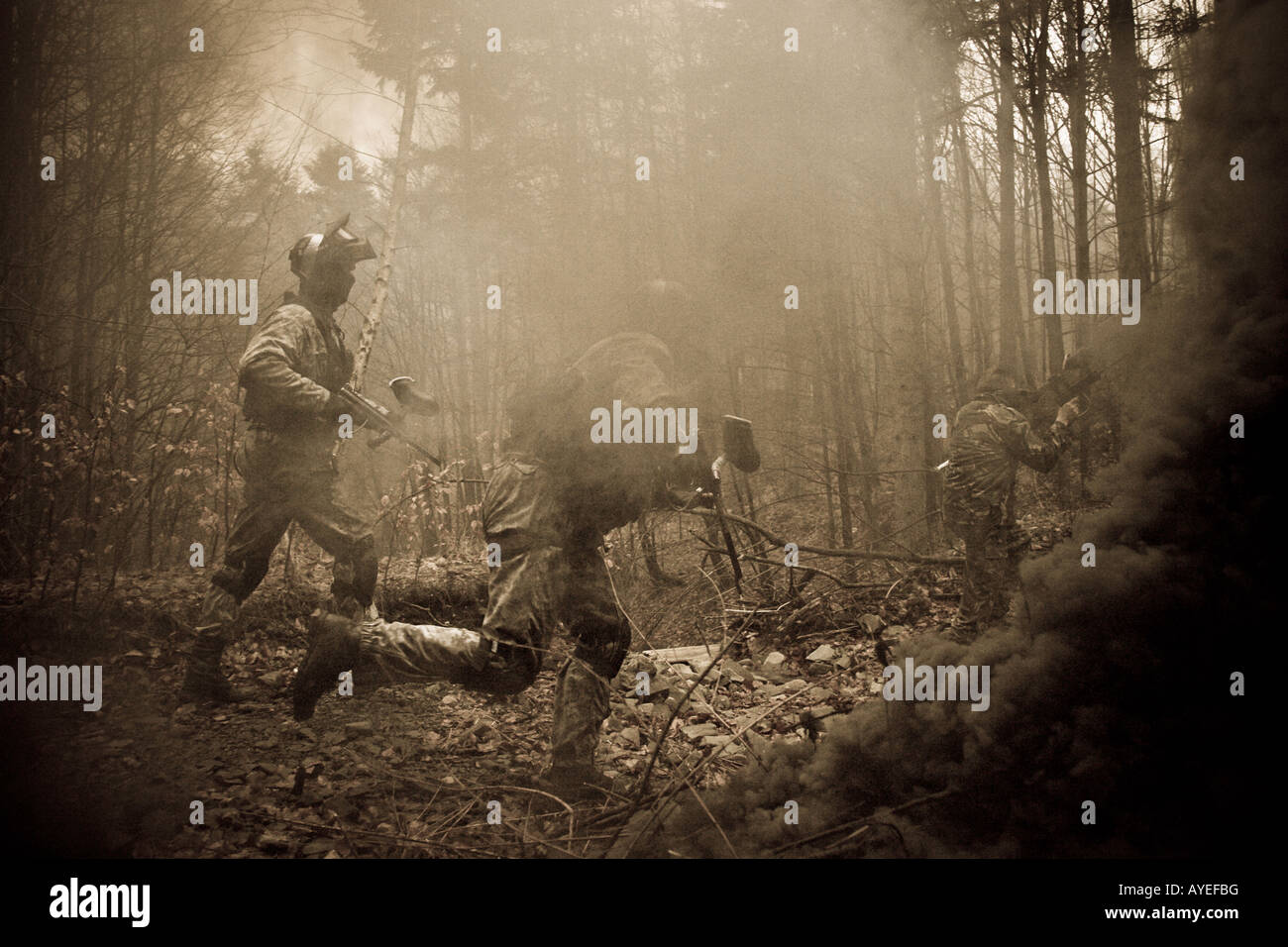 Two anti-terrorist soldiers during a training with paintball guns. They ...