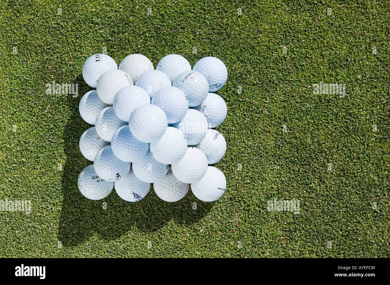 Stack golf balls hi-res stock photography and images - Alamy