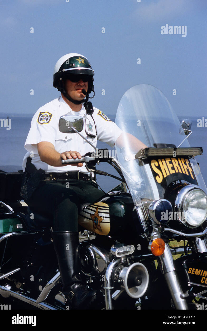 A policeman on his motorcycle in orlando Stock Photo - Alamy