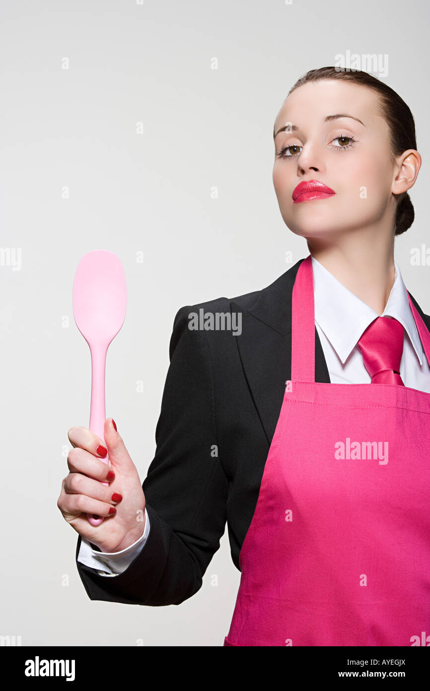 Young woman with spoon Stock Photo - Alamy