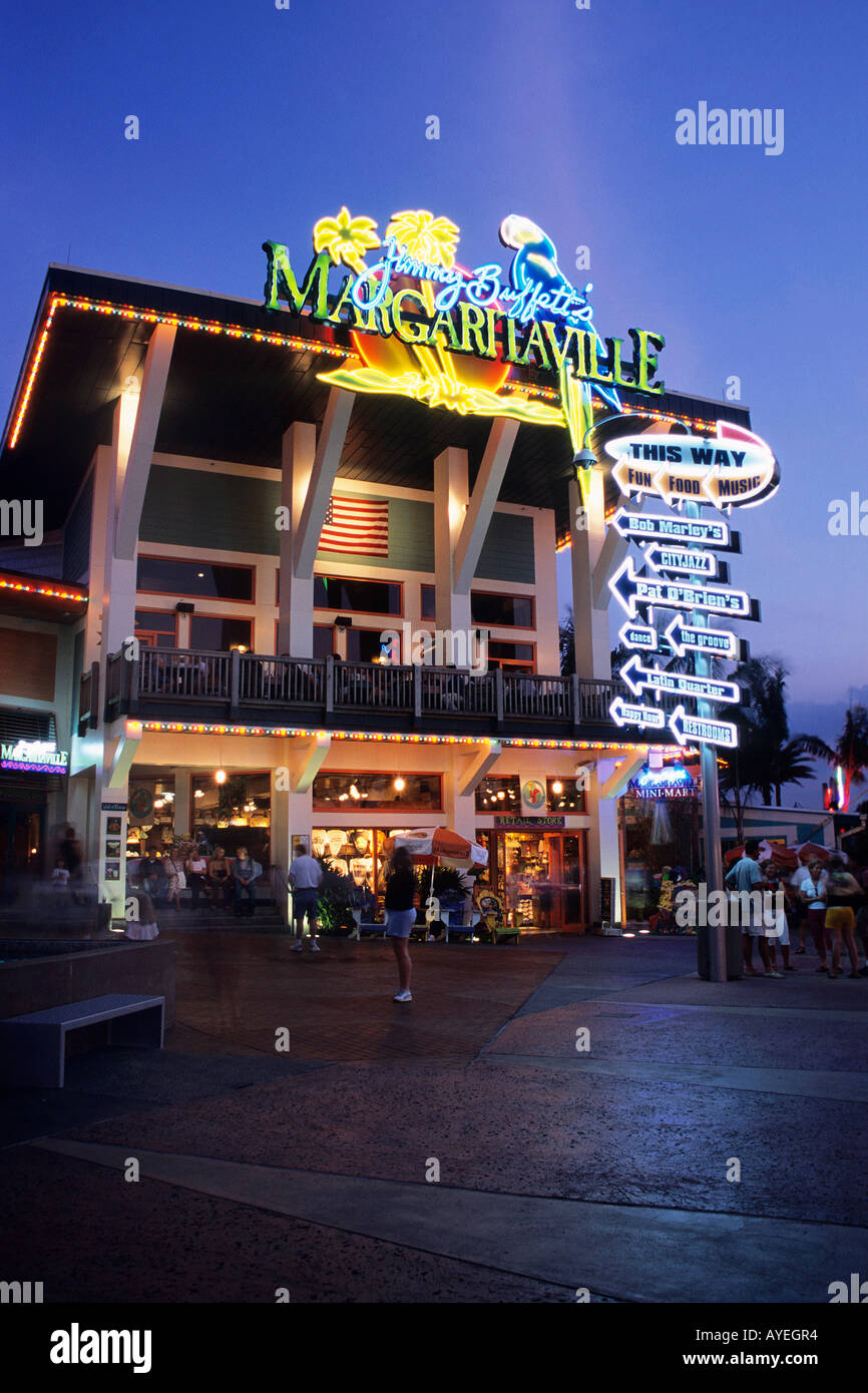 Neon signs on the front of a building at City Walk at night Stock Photo ...