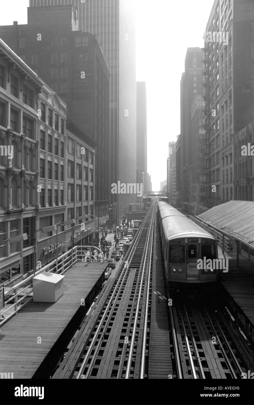 El train among buildings in the Chicago Loop Stock Photo - Alamy