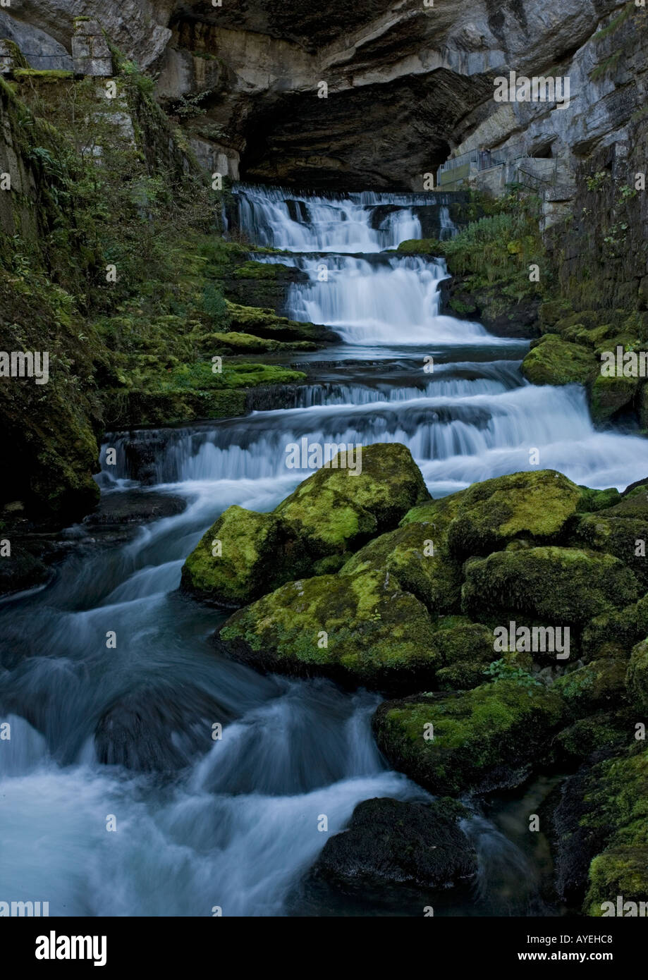 The source of the River Loue where it emerges from a huge cave at the ...