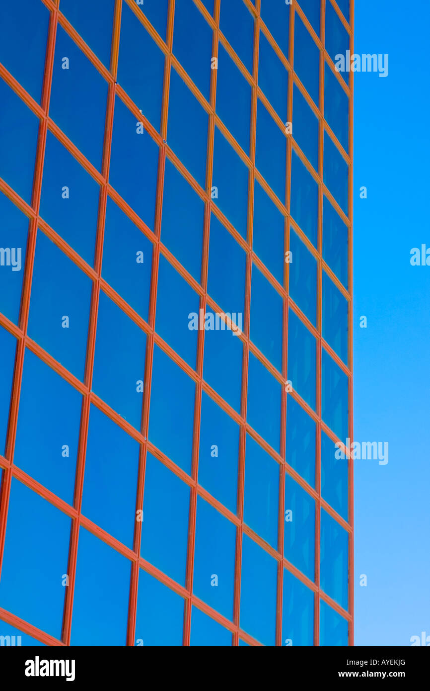 Blue windows from office building against blue sky Stock Photo - Alamy
