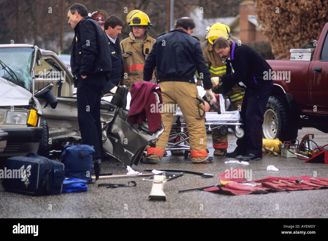 Fire and rescue officers on the scene of an automobile accident Stock ...