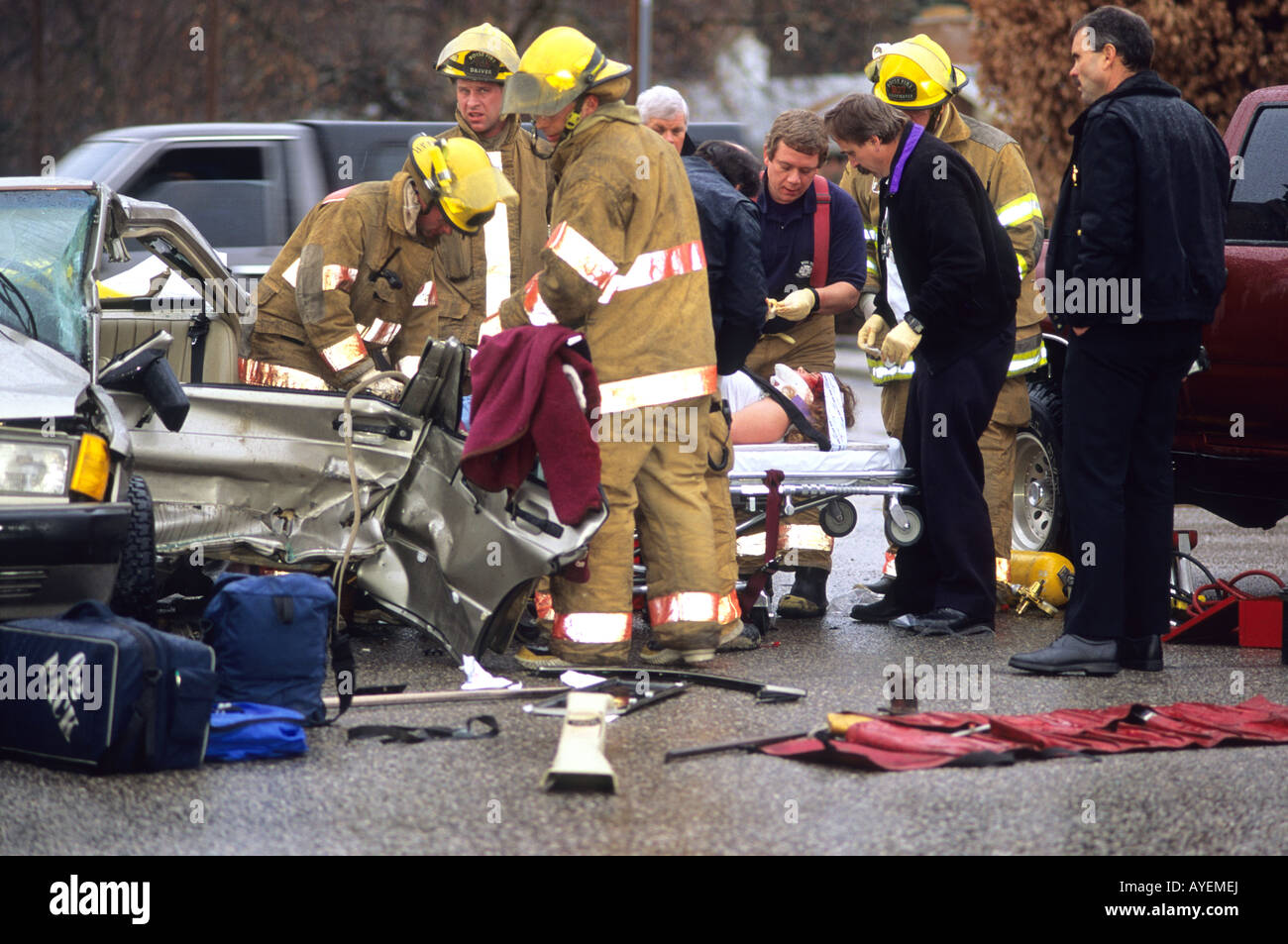 Fire and rescue officers on the scene of an automobile accident Stock ...