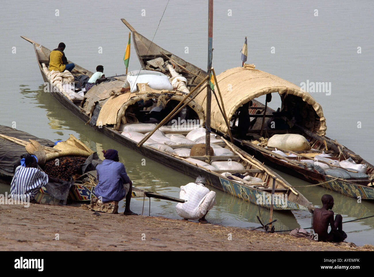 Traditional wooden boats or pirogues on the Niger River in Mopti, Mali ...