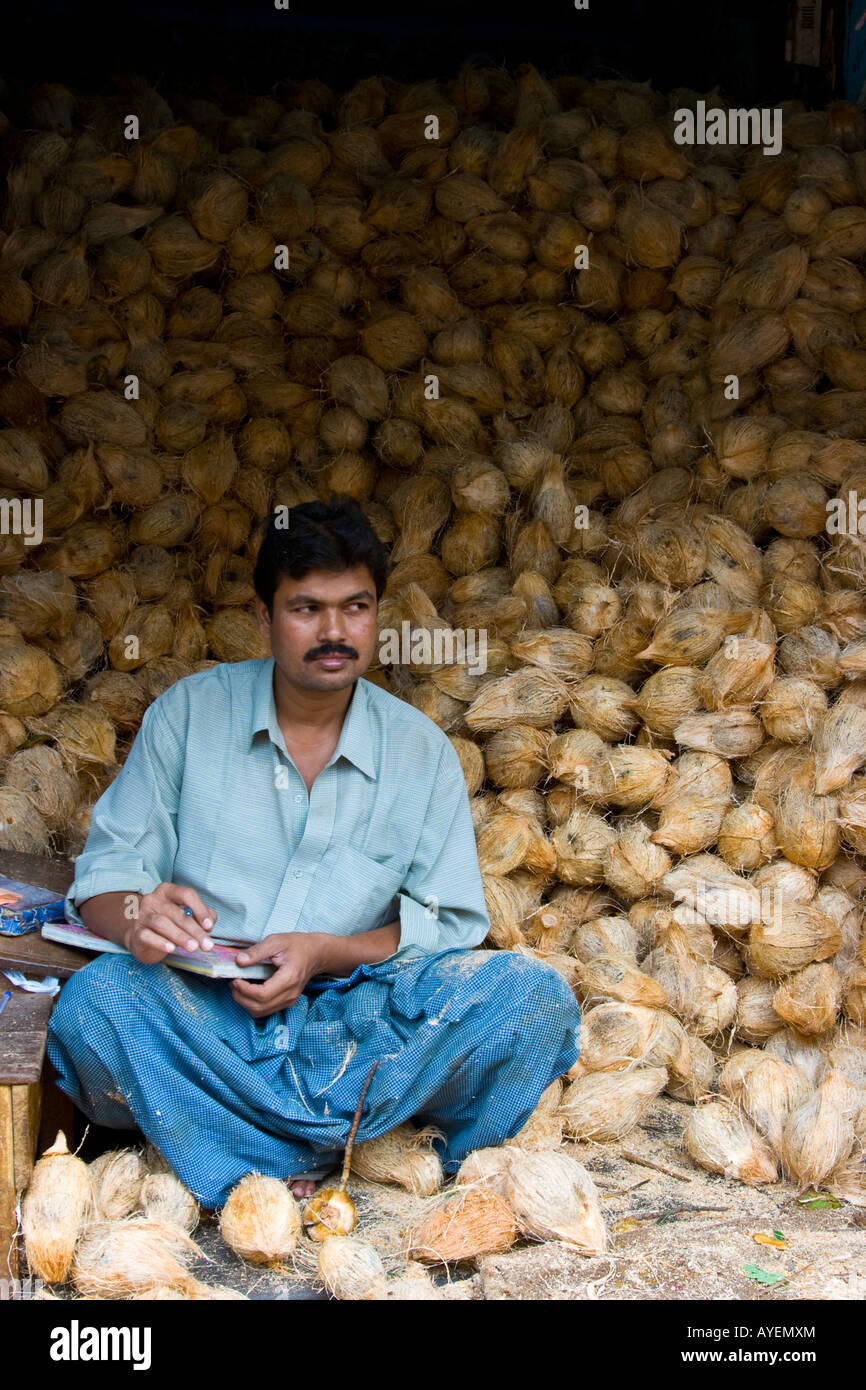 Man Selling Coconuts in a Market in Madurai South India Stock Photo - Alamy