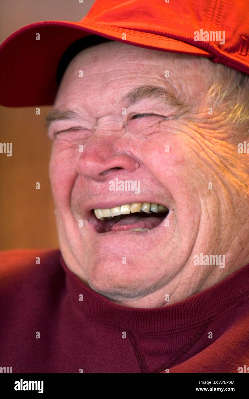 Portrait of a man laughing Stock Photo - Alamy